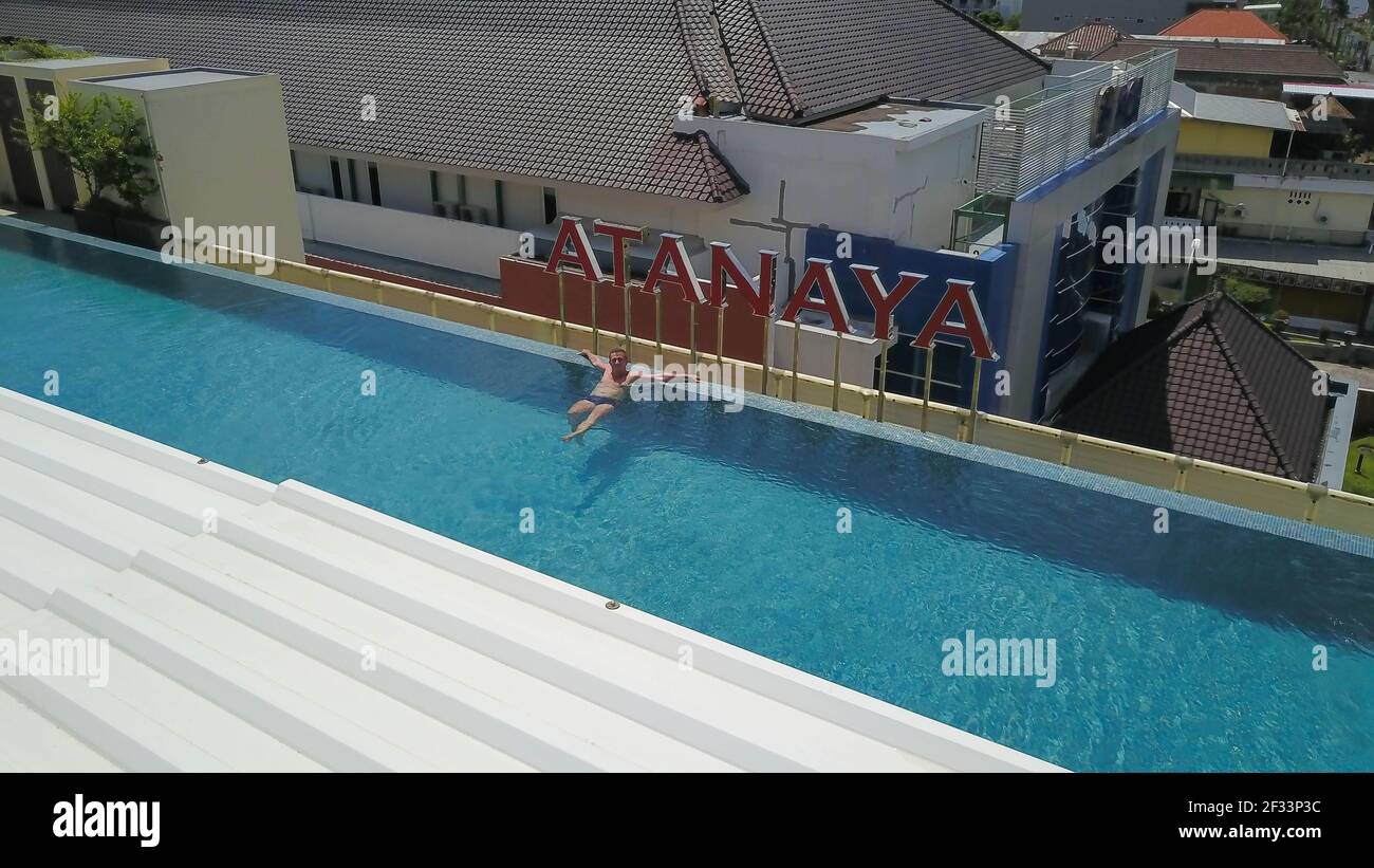 Kuta, Bali, Indonesia, March 13, 2021. Aerial footage of a man in the ...
