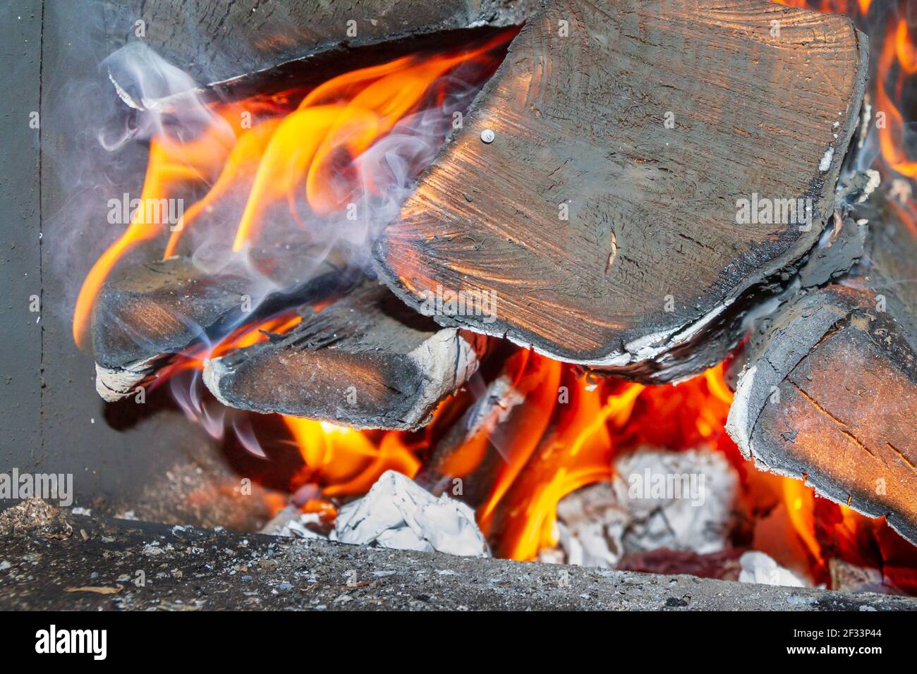 Dry wood burns brightly in the stove in the bath Stock Photo - Alamy