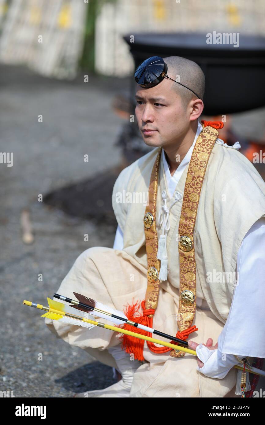 Hachioji, Japan. 14th Mar, 2021. A monk is seen preparing for the Fire ...