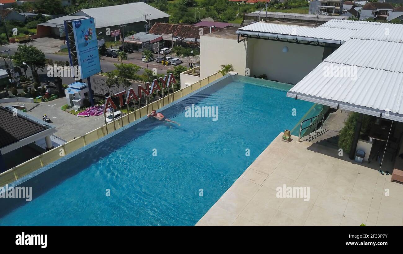 Kuta, Bali, Indonesia, March 13, 2021. Aerial footage of a man in the ...