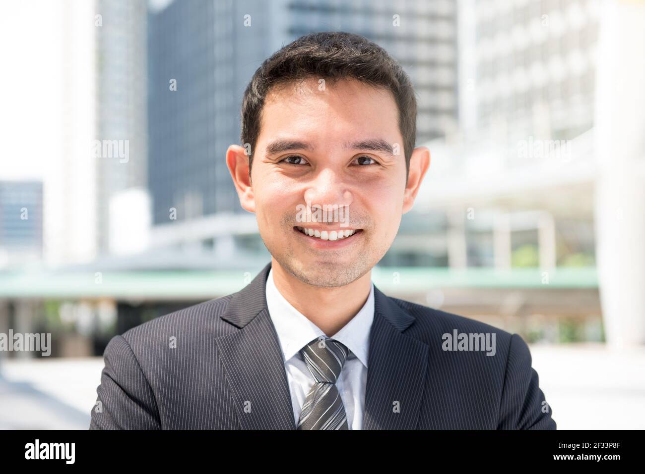 Face happy young handsome businessman hi-res stock photography and ...
