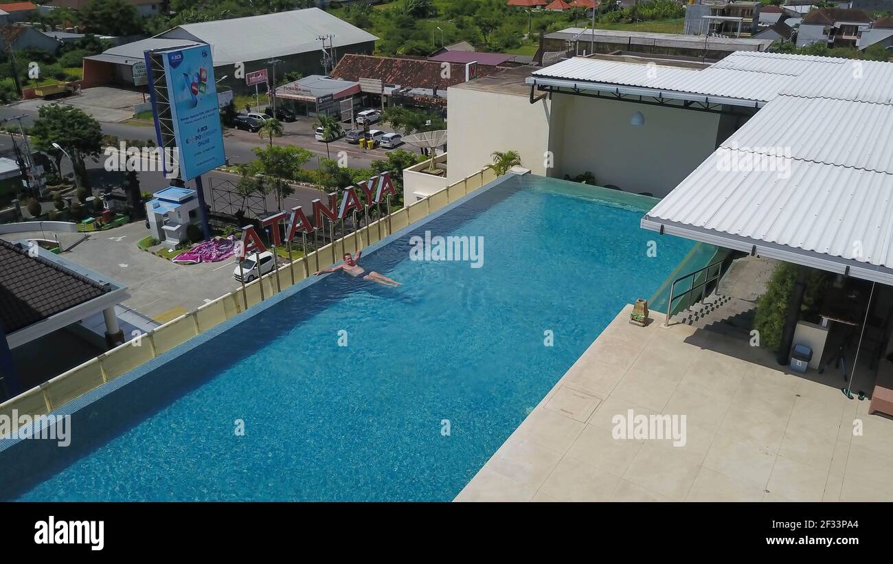 Kuta, Bali, Indonesia, March 13, 2021. Aerial footage of a man in the ...