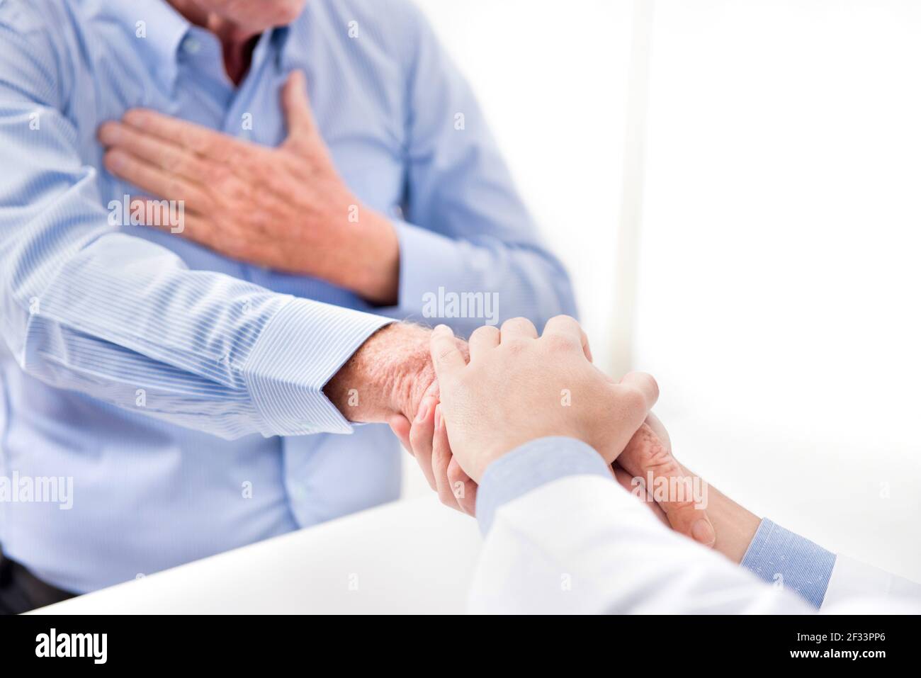 Doctor hand holding patient hand hi-res stock photography and images ...
