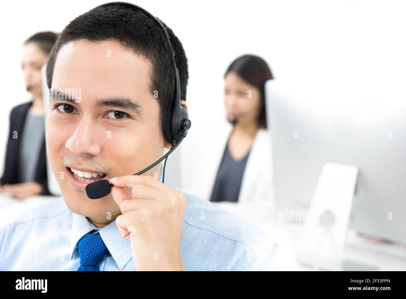 Call center young man hi-res stock photography and images - Alamy