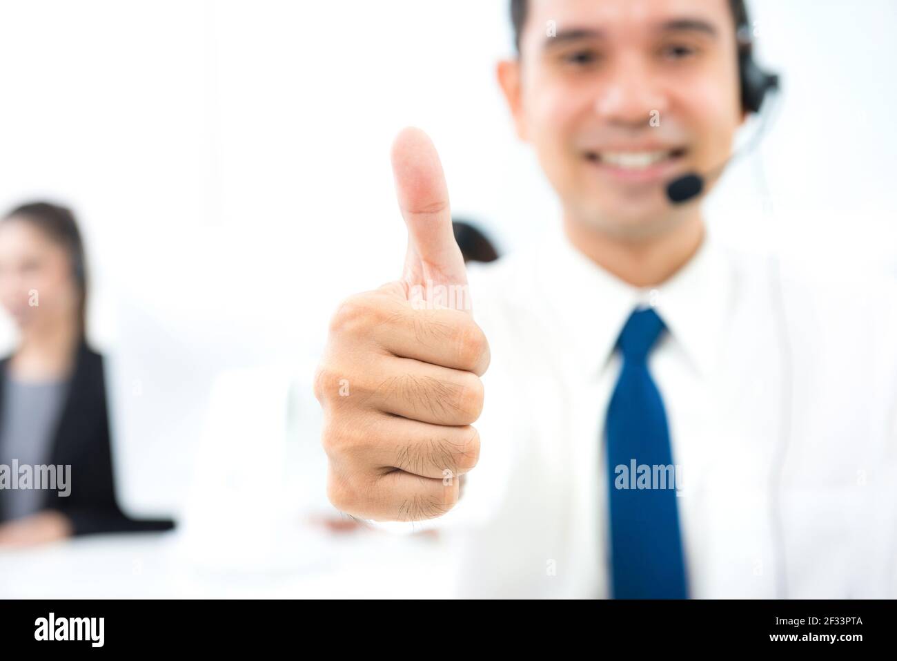 Call center giving thumbs up hi-res stock photography and images - Alamy