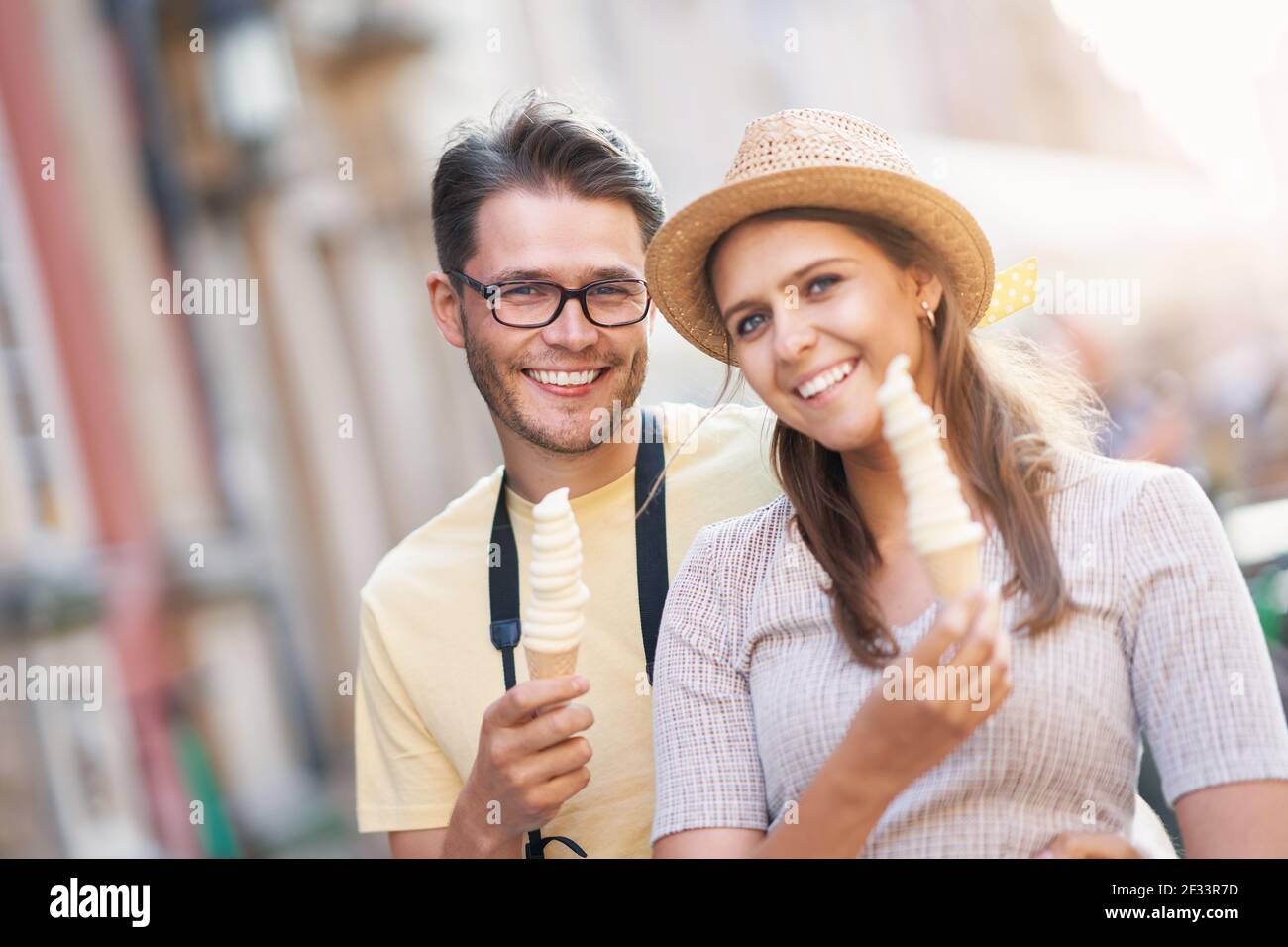 Happy tourists sightseeing during summer holidays Stock Photo - Alamy