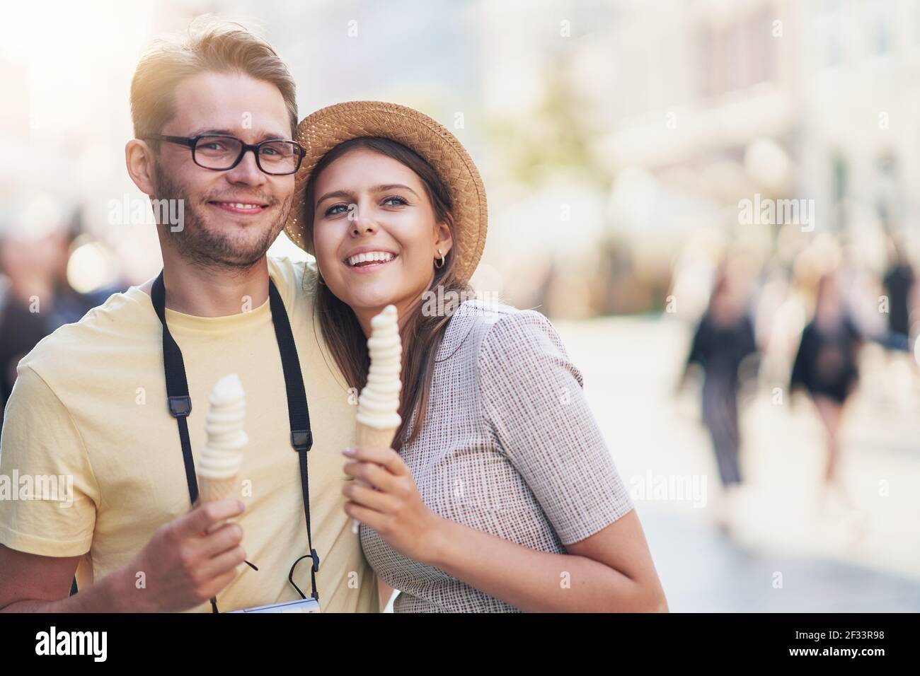 Happy tourists sightseeing during summer holidays Stock Photo - Alamy