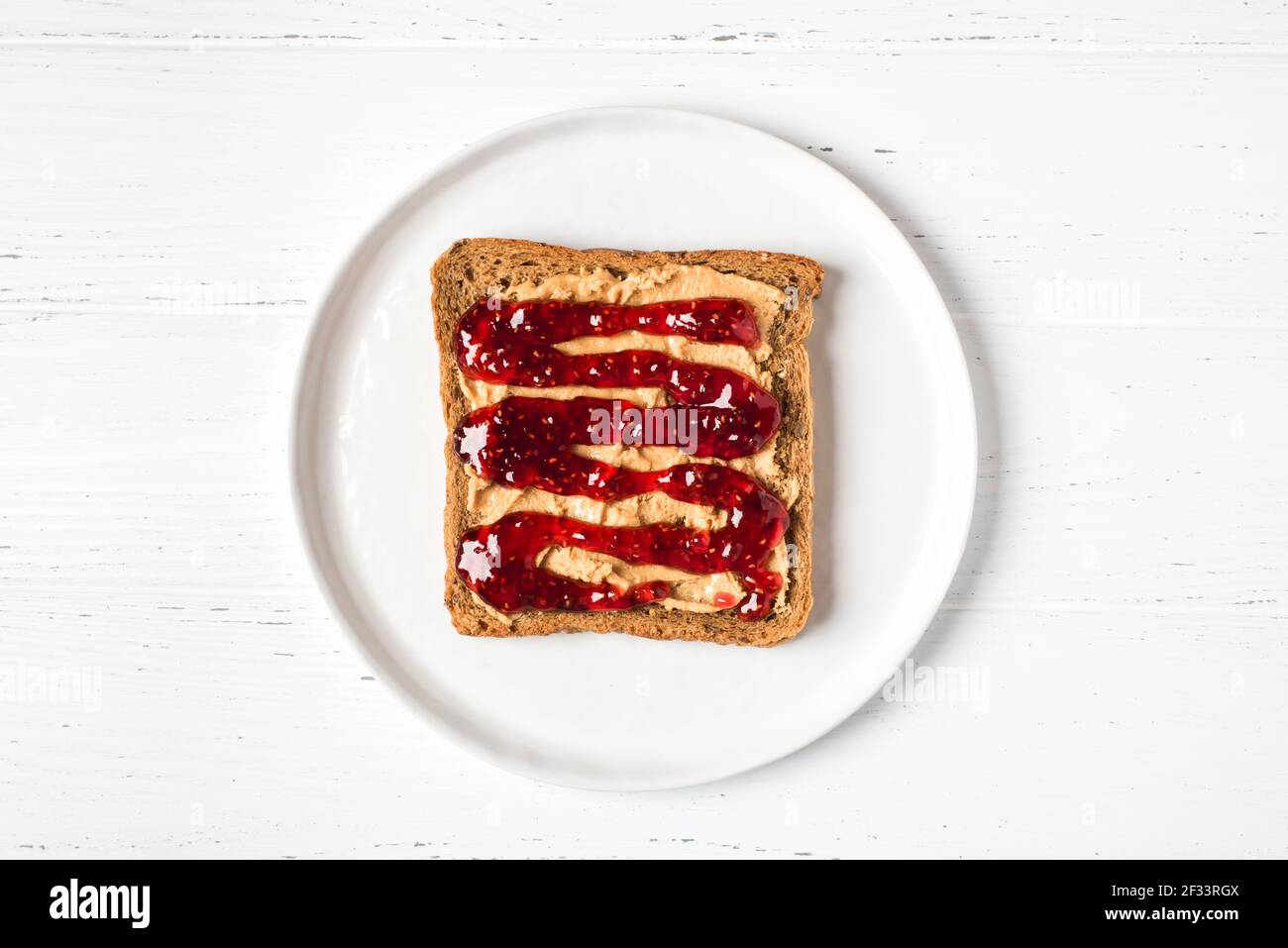 Homemade peanut butter sandwich with raspberry jam Stock Photo - Alamy