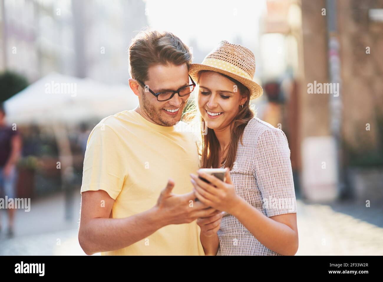 Happy tourists sightseeing during summer holidays Stock Photo - Alamy