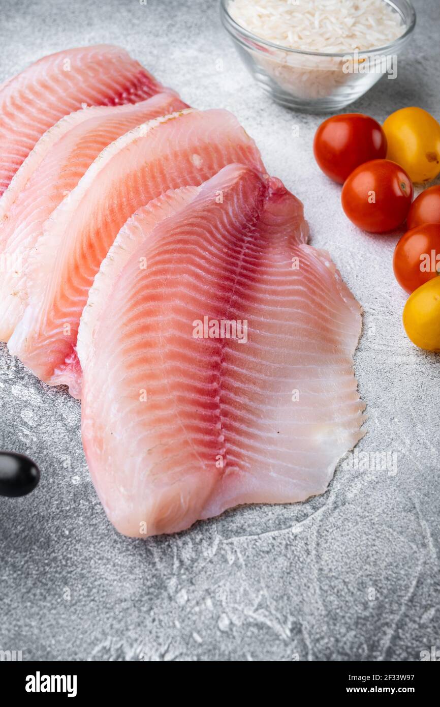 White fish fillet, with basmati rice and cherry tomatoes ingredients ...