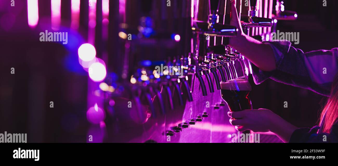 Bartender beer pumps hi-res stock photography and images - Alamy