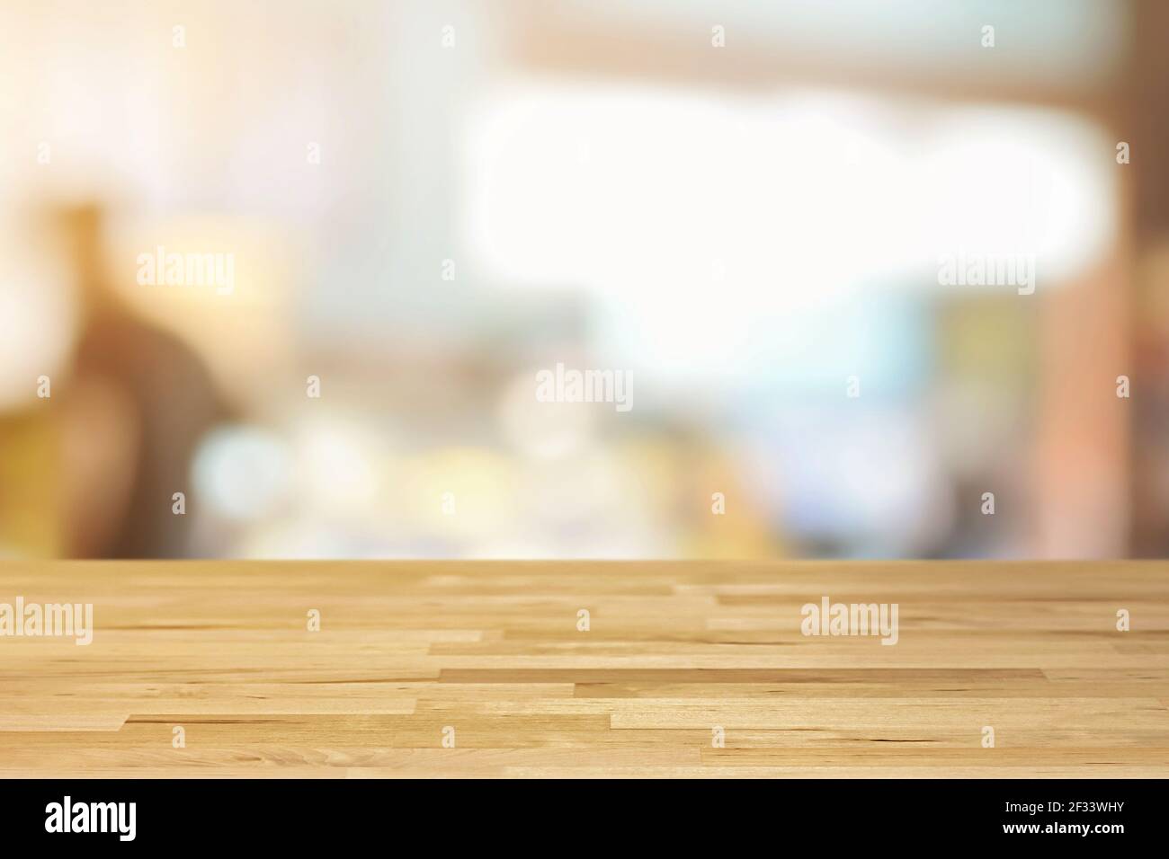 Wood table top on blur background - can be used for display or montage ...