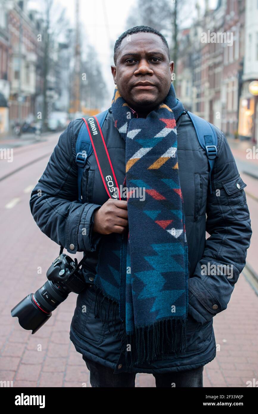 Amsterdam, Netherlands. Male photographer roaming the streets of the ...