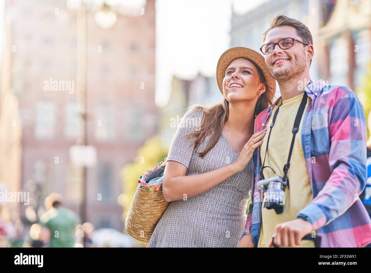Happy tourists sightseeing during summer holidays Stock Photo - Alamy