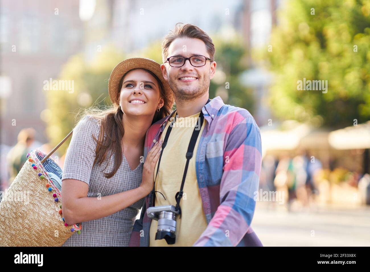 Happy tourists sightseeing during summer holidays Stock Photo - Alamy