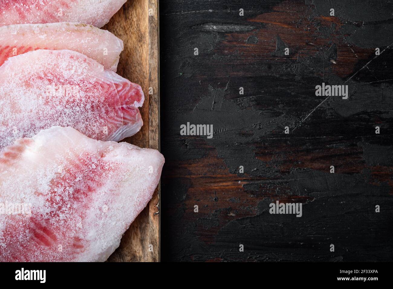 Frozen, white fish fillet, top view with copy space for text Stock ...