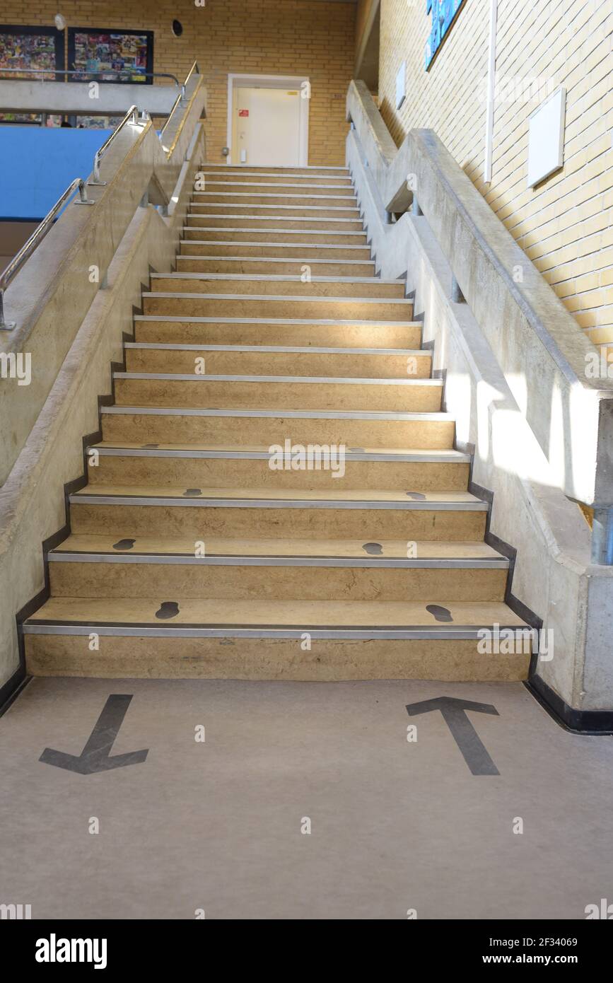 Stairs going up and down in a school building Stock Photo - Alamy