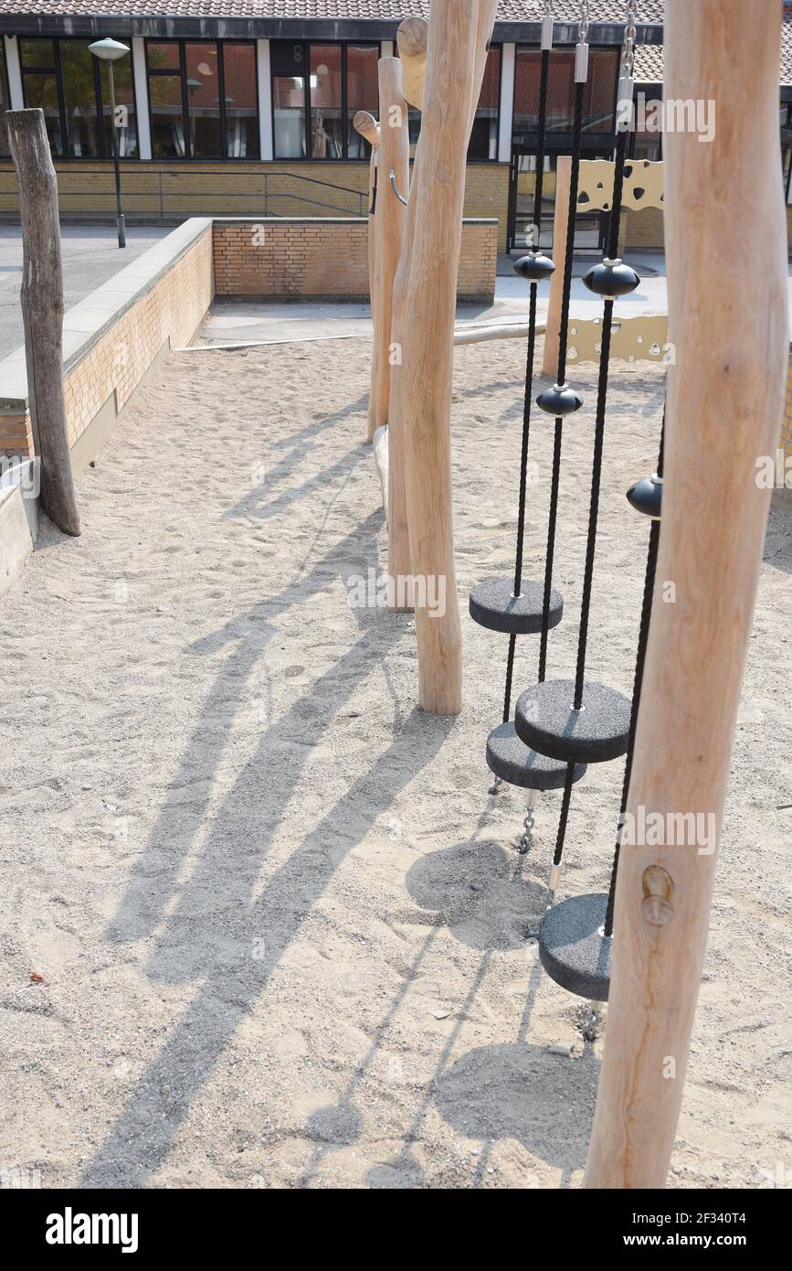 Wood playground equipment for young kids Stock Photo - Alamy