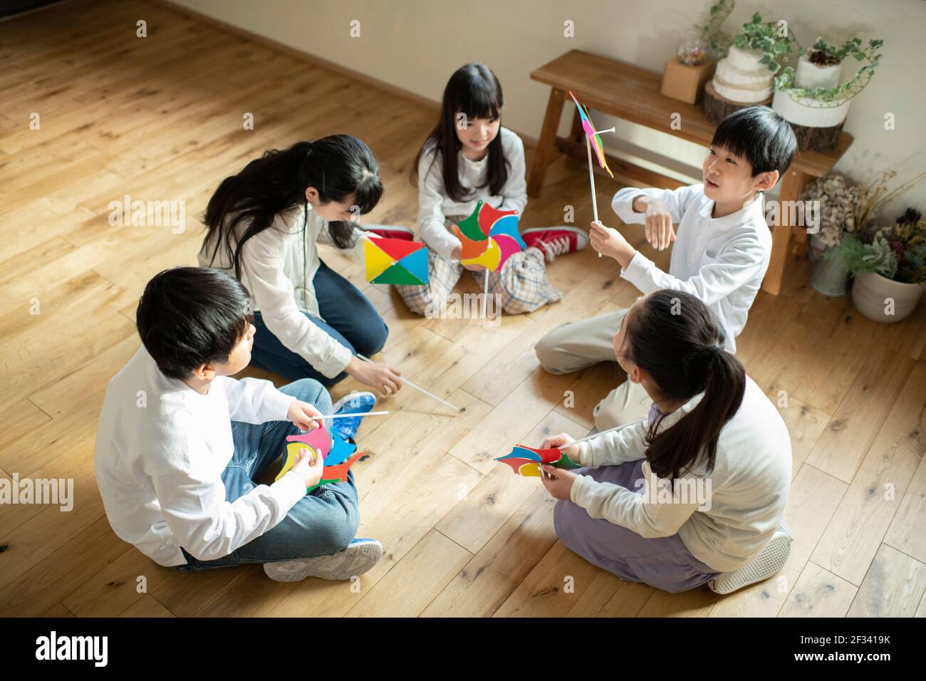 Children Making Pinwheel Stock Photo - Alamy