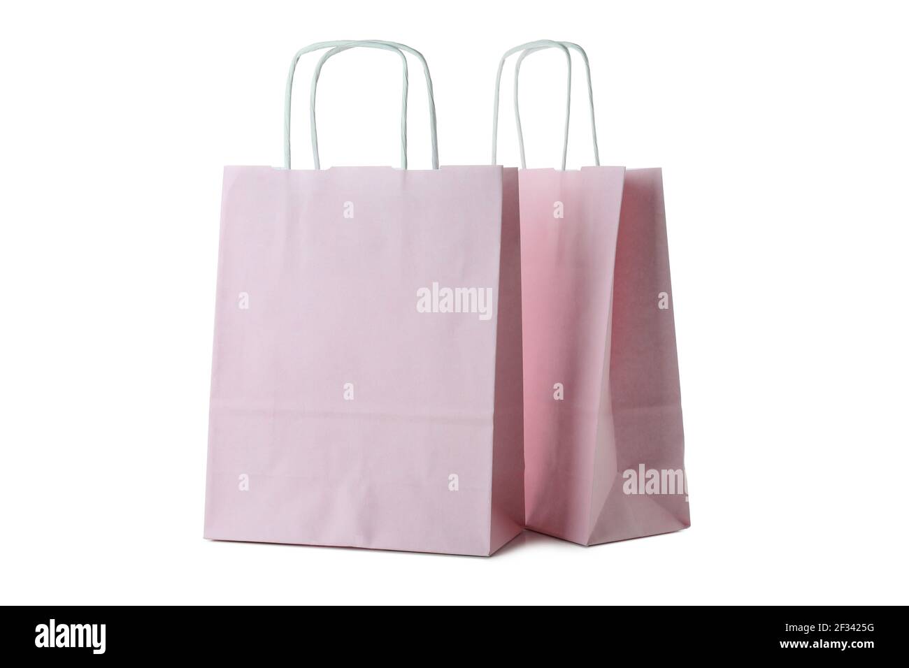 Pink paper bags isolated on white background Stock Photo - Alamy