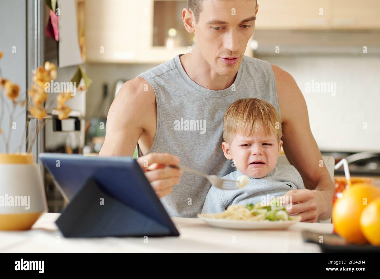 Child crying eating hi-res stock photography and images - Alamy