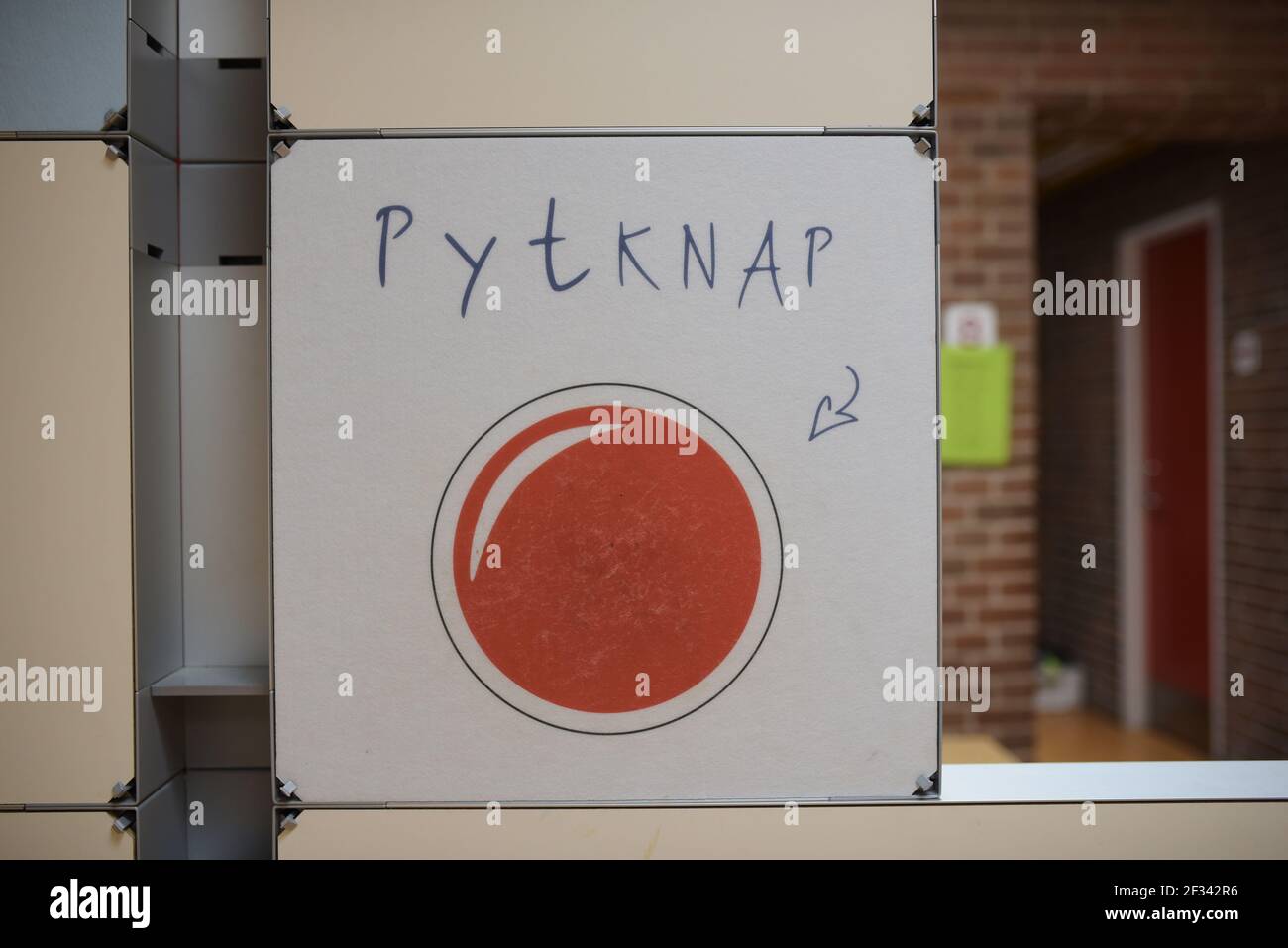 Red button on paper made for students Stock Photo - Alamy