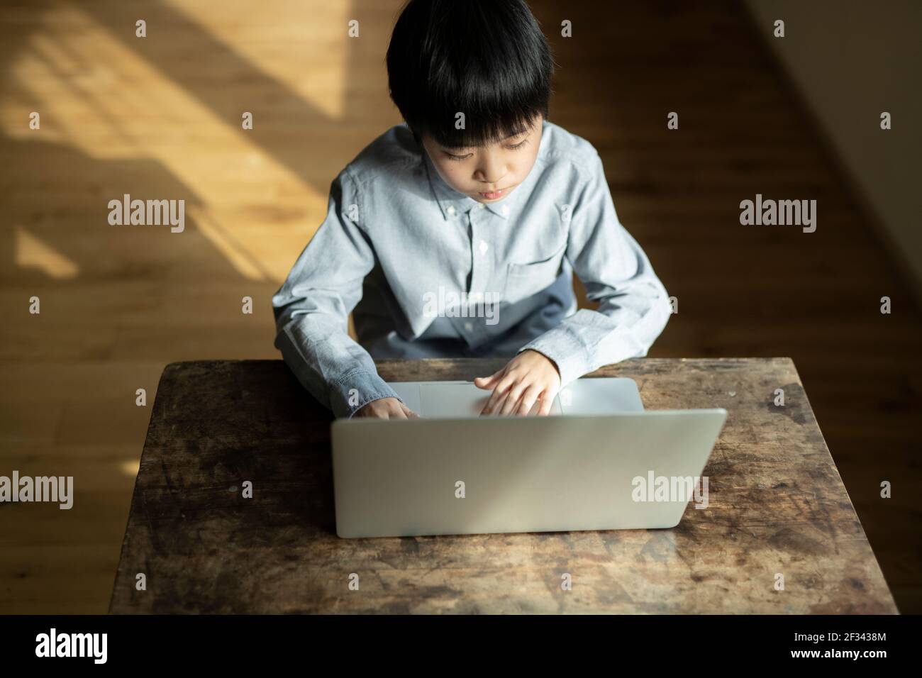 Black boy computer typing hi-res stock photography and images - Alamy