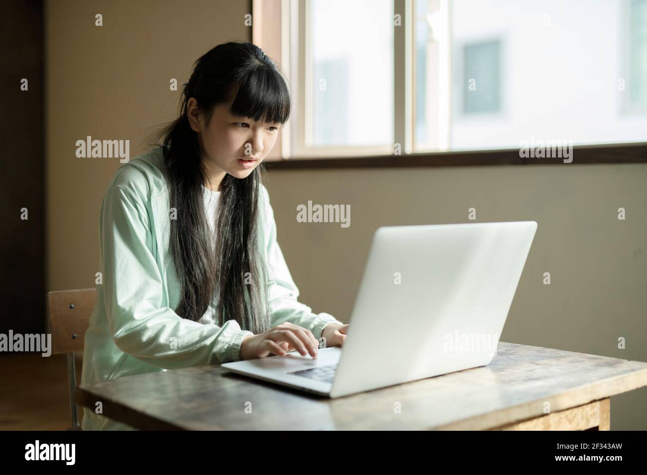 Girl entering room hi-res stock photography and images - Alamy