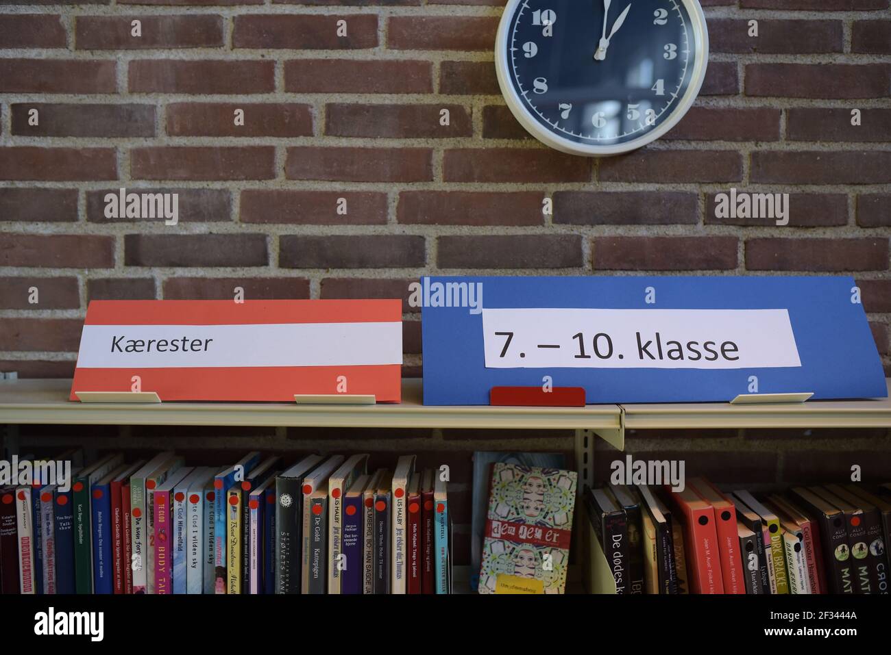 book categories on a bookshelf in a library in school Stock Photo - Alamy