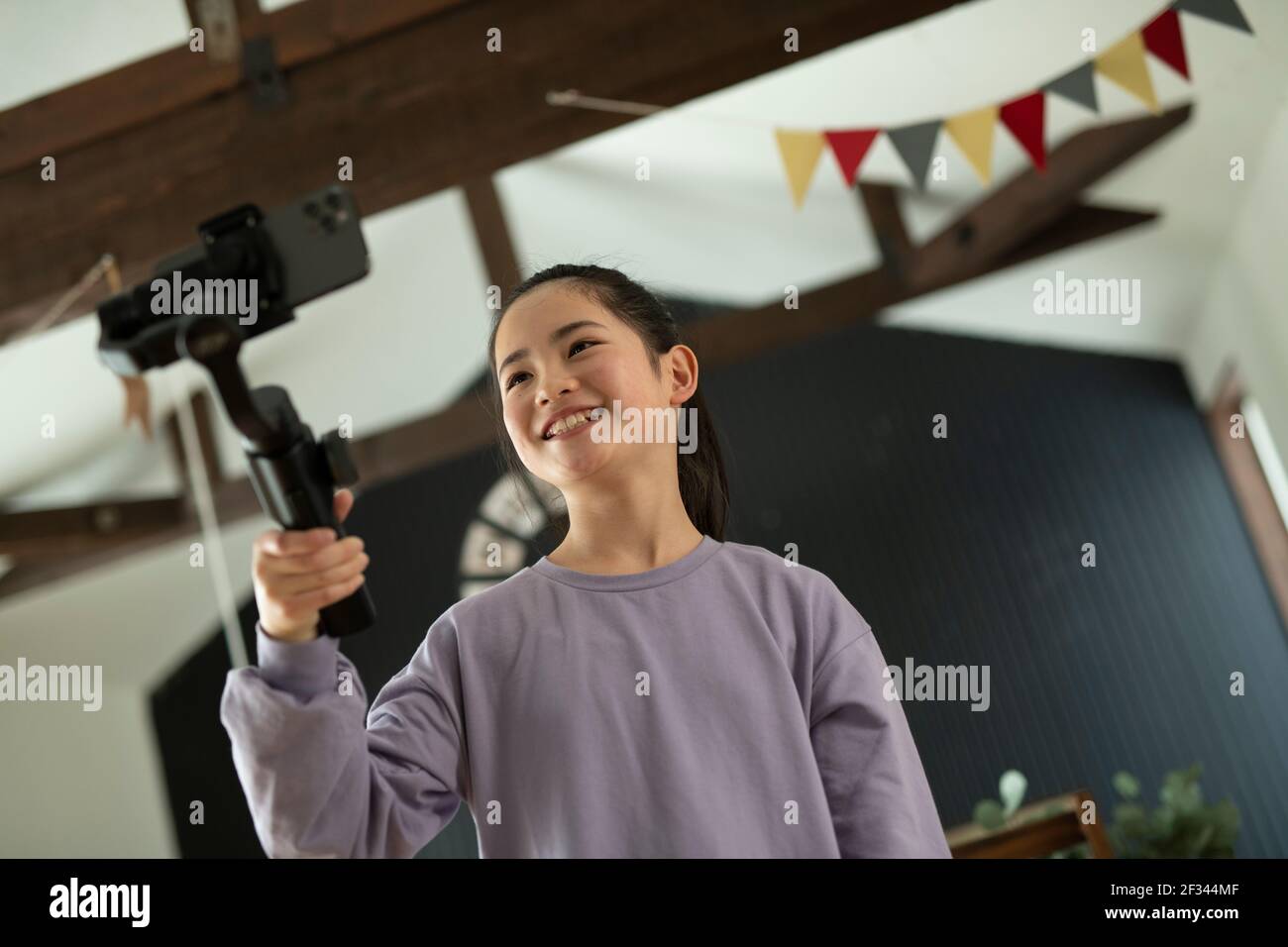 Live streaming child hi-res stock photography and images - Alamy
