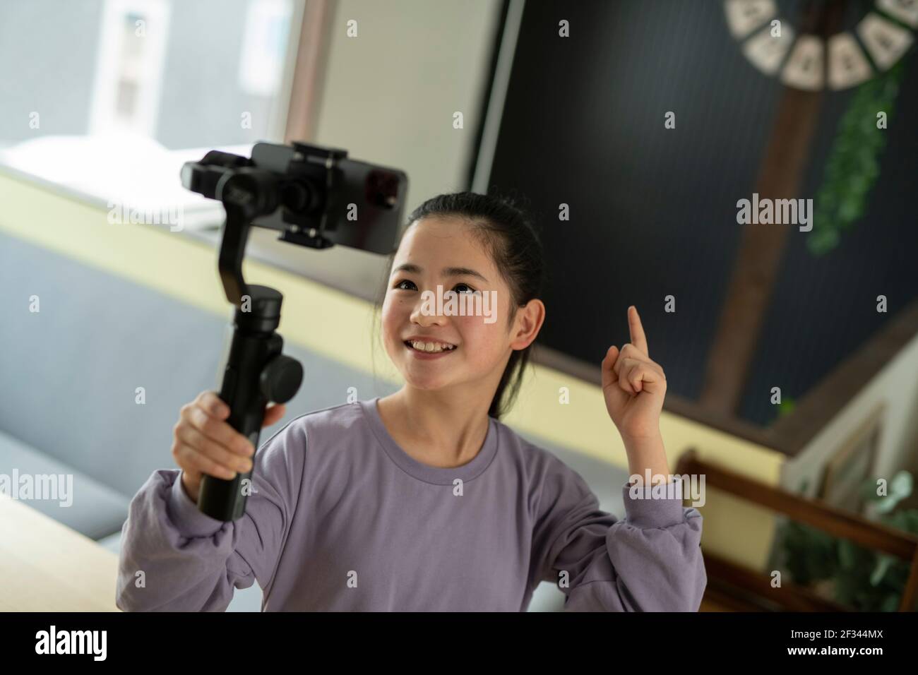 Asian girl photographing school hi-res stock photography and images - Alamy