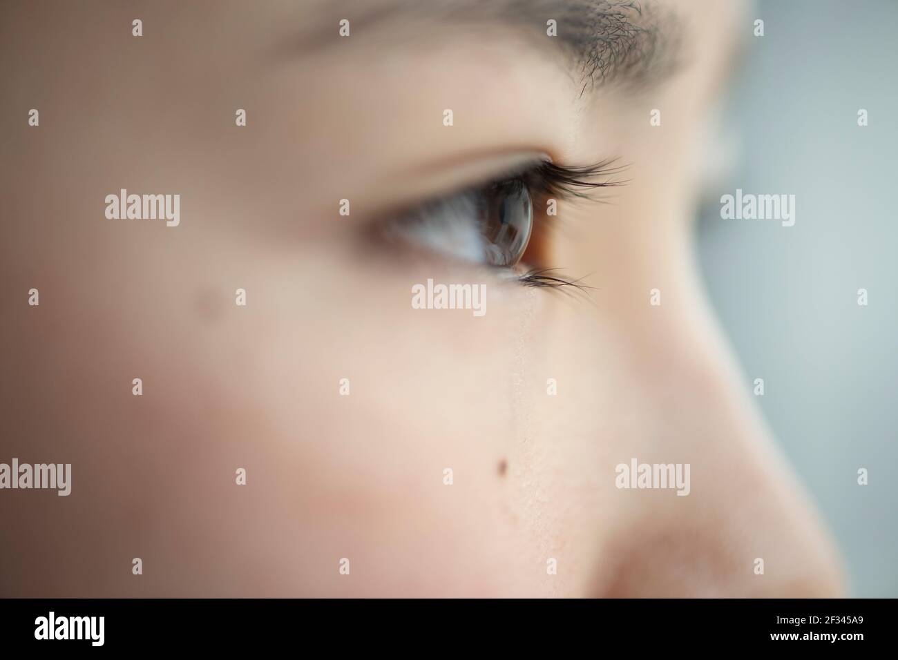 Girl Staring into the Distance Stock Photo - Alamy