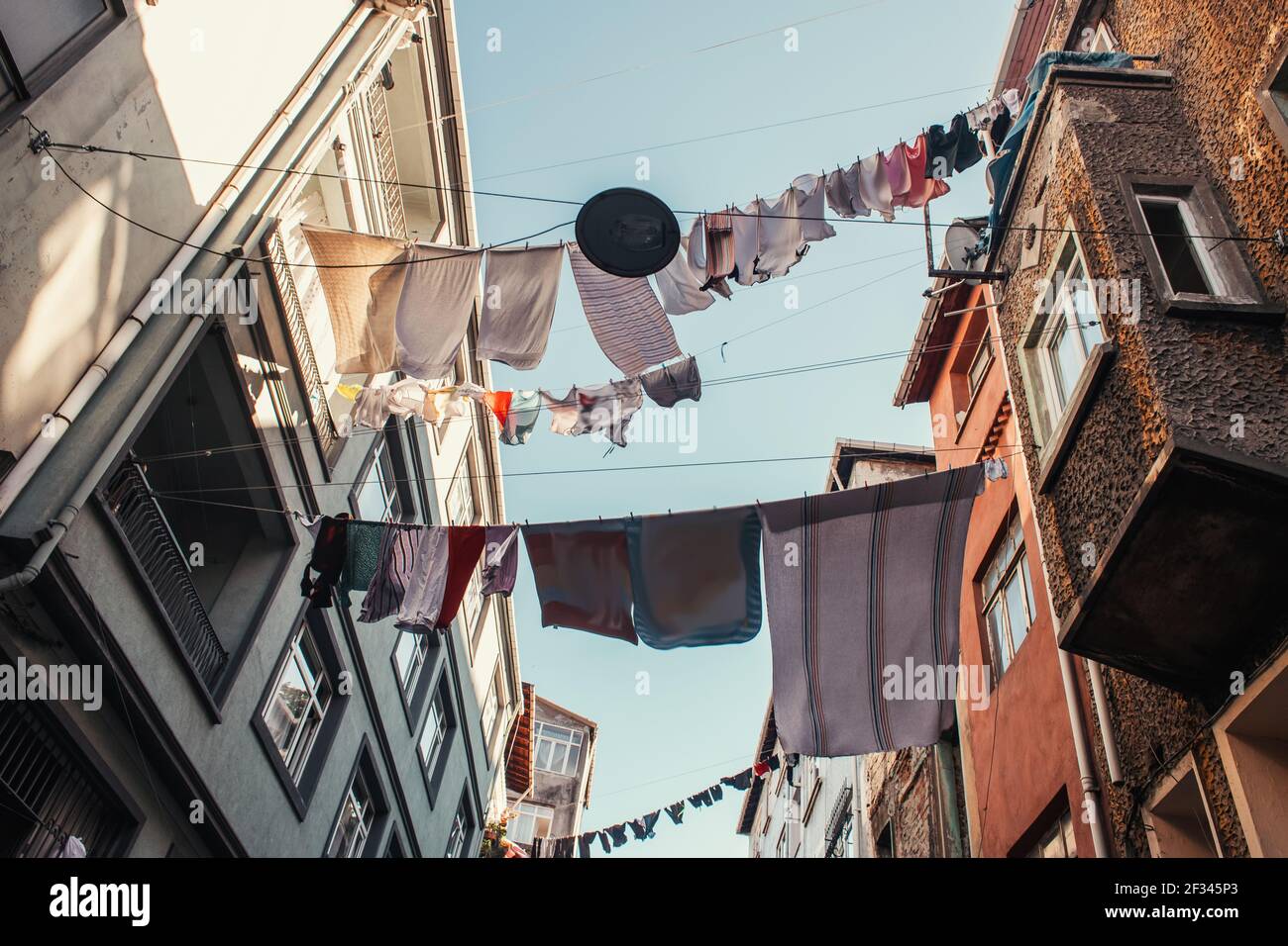 Laundry on clothesline between houses hi-res stock photography and ...