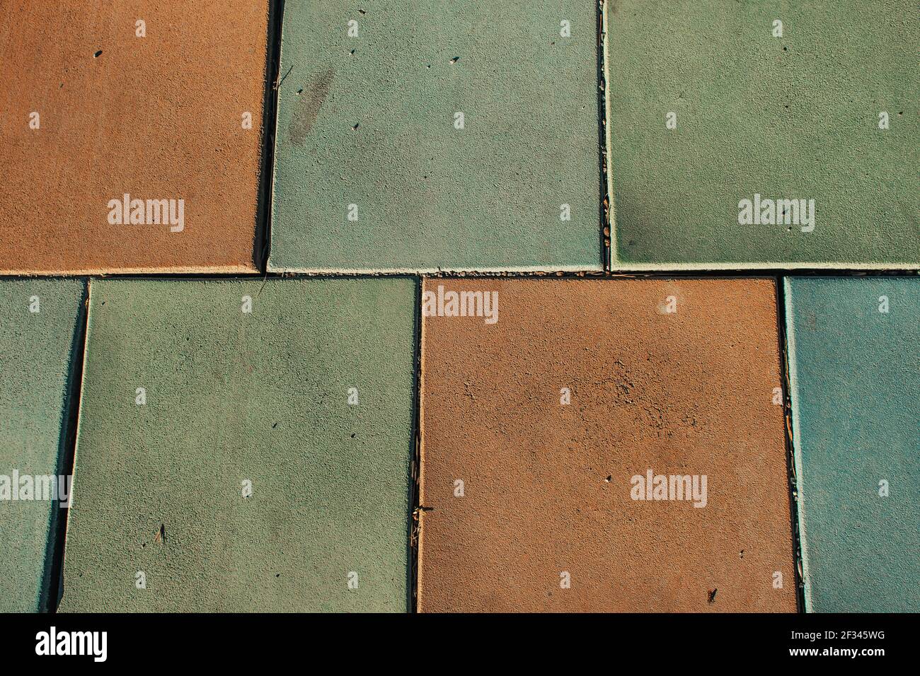 background with brown and grey ceramic tiles, top view Stock Photo - Alamy