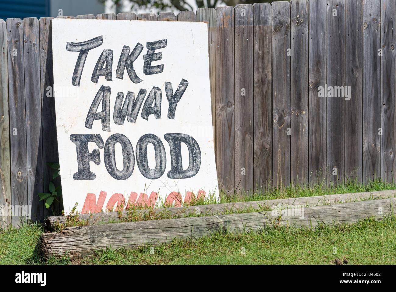 Hand painted take away food sign hi-res stock photography and images ...