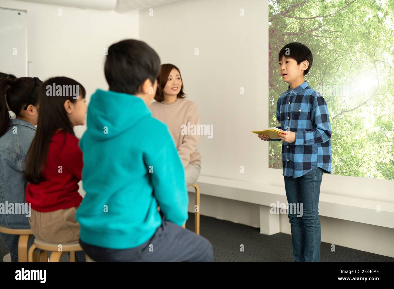 Child Giving Presentation Stock Photo - Alamy