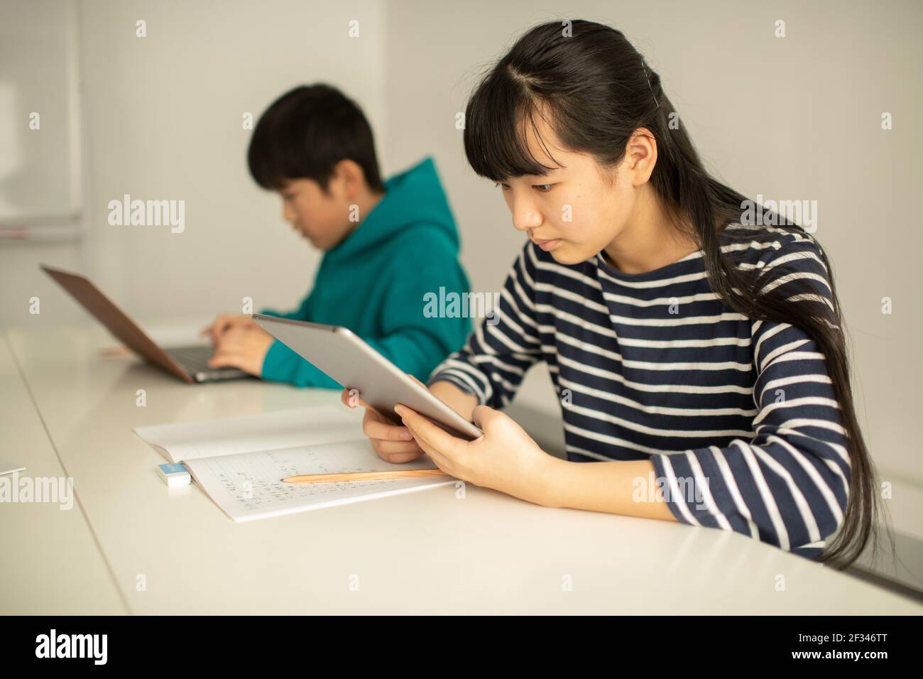 Child girl digital technology japan hi-res stock photography and images ...