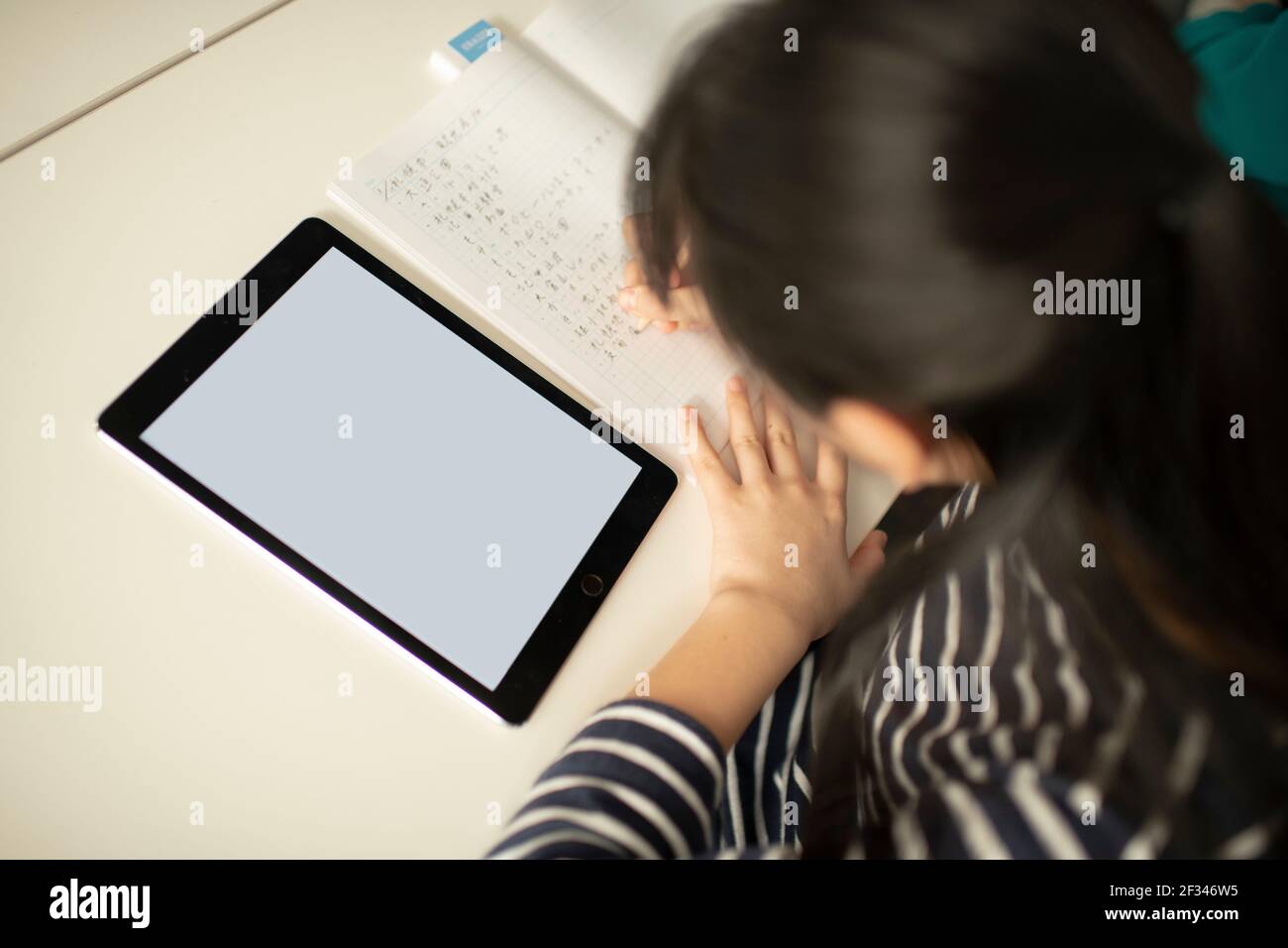 ICT in Education - Boy and Girl Looking at Tablet PC Stock Photo - Alamy
