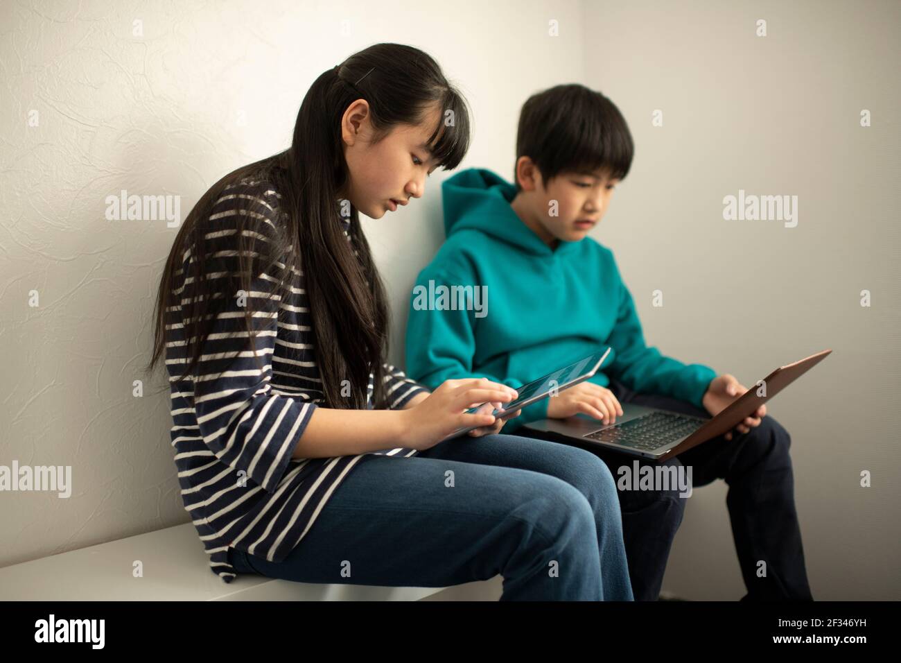 Child girl digital technology japan hi-res stock photography and images ...