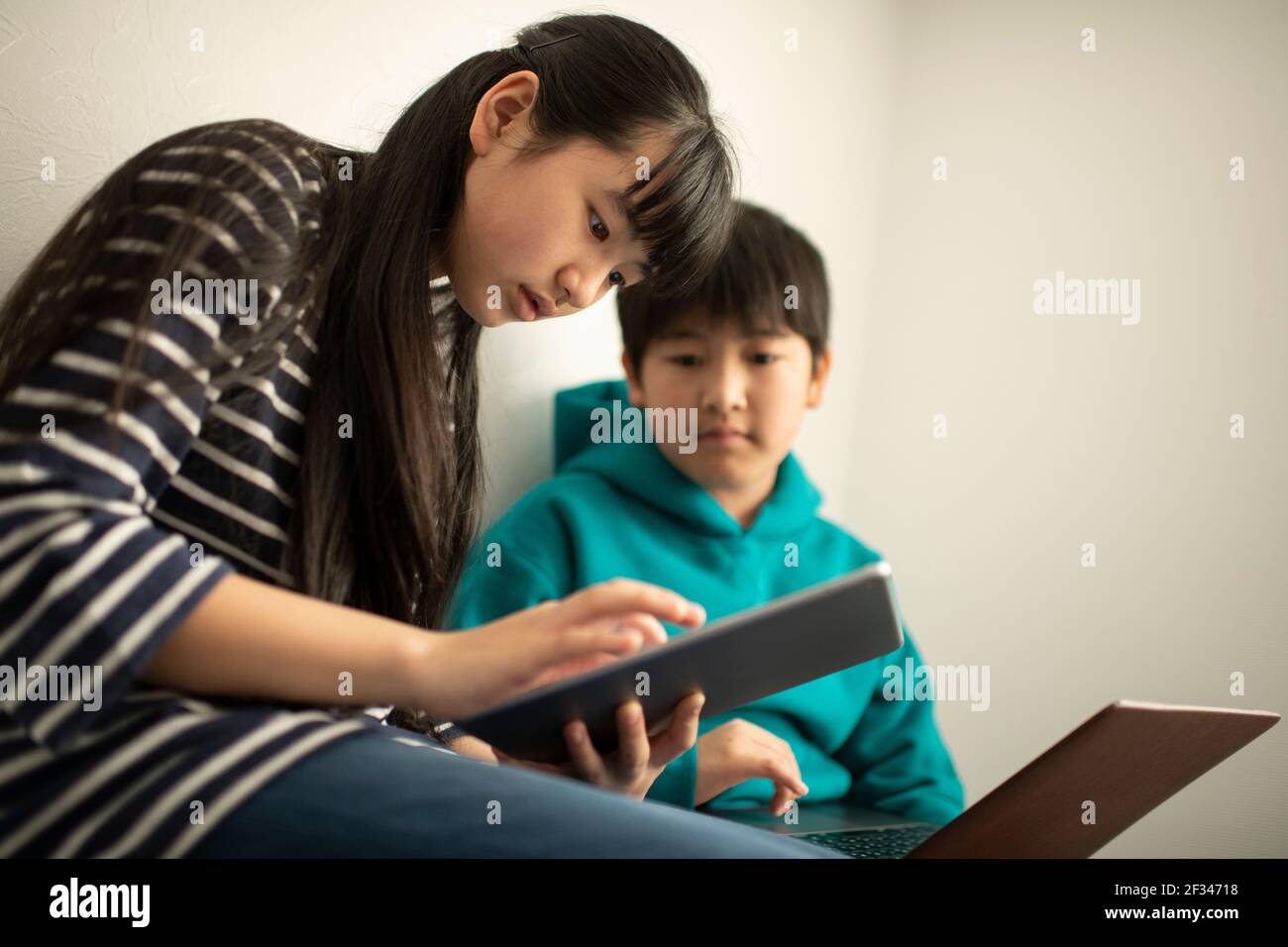 Child girl digital technology japan hi-res stock photography and images ...