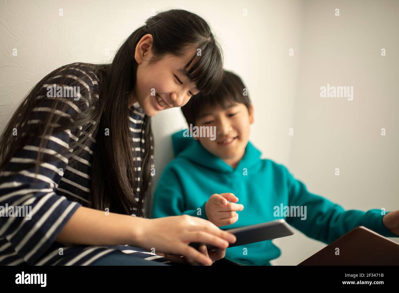 Child girl digital technology japan hi-res stock photography and images ...