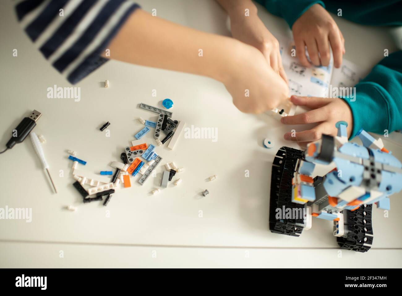 Elementary School Students Assembling Programming Robot Stock Photo - Alamy