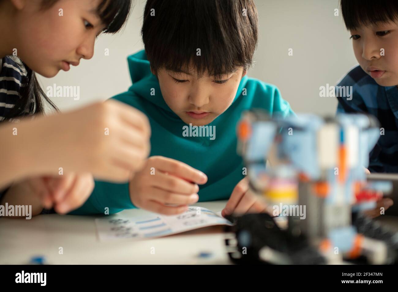 Elementary School Students Assembling Programming Robot Stock Photo - Alamy