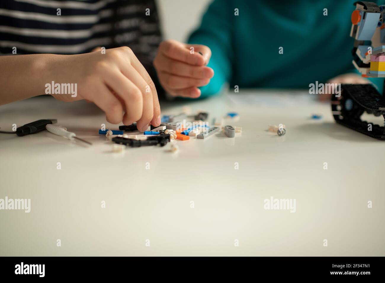 Programming robot hi-res stock photography and images - Alamy
