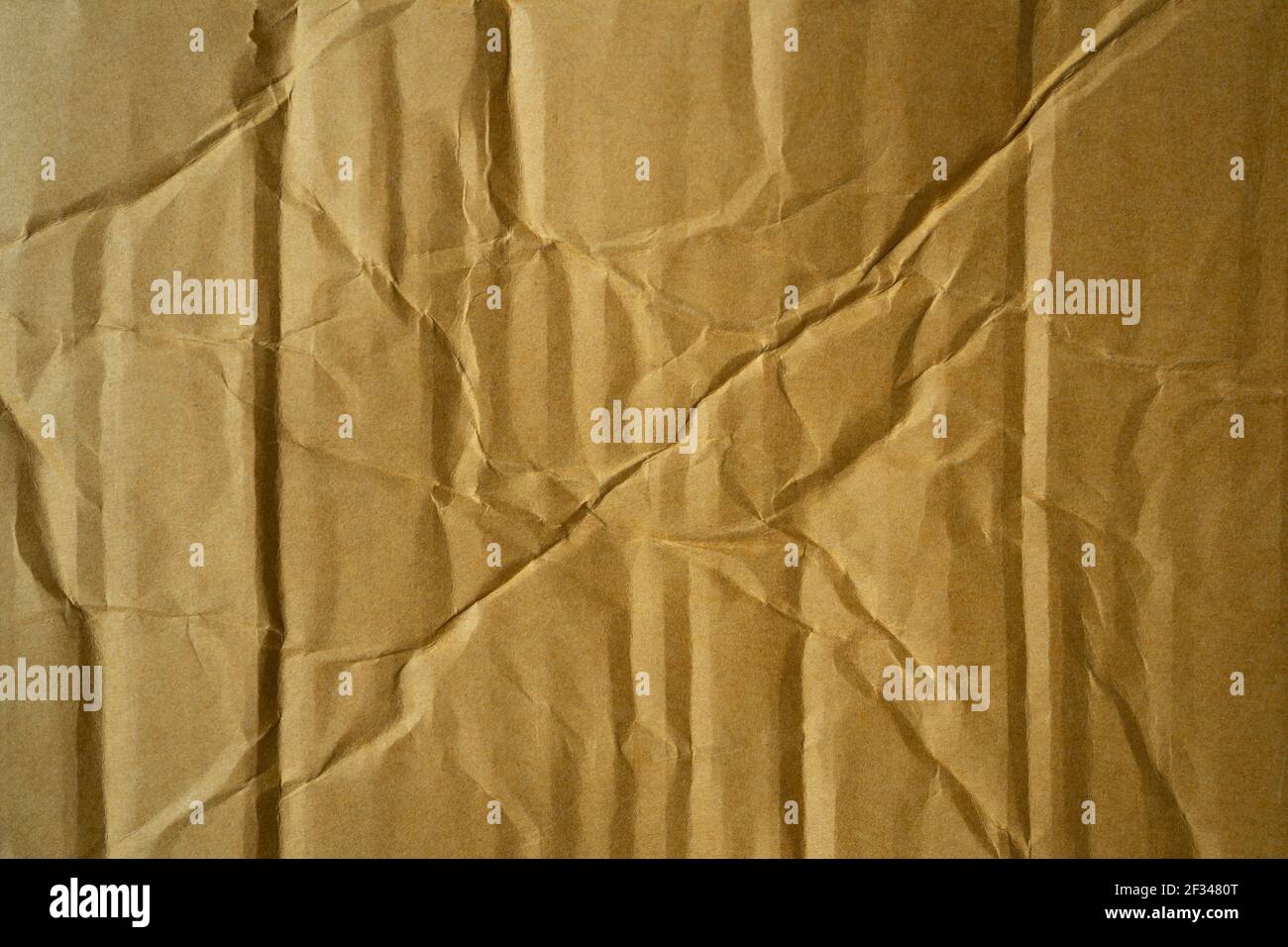 wrinkled brown cardboard paper texture background Stock Photo - Alamy