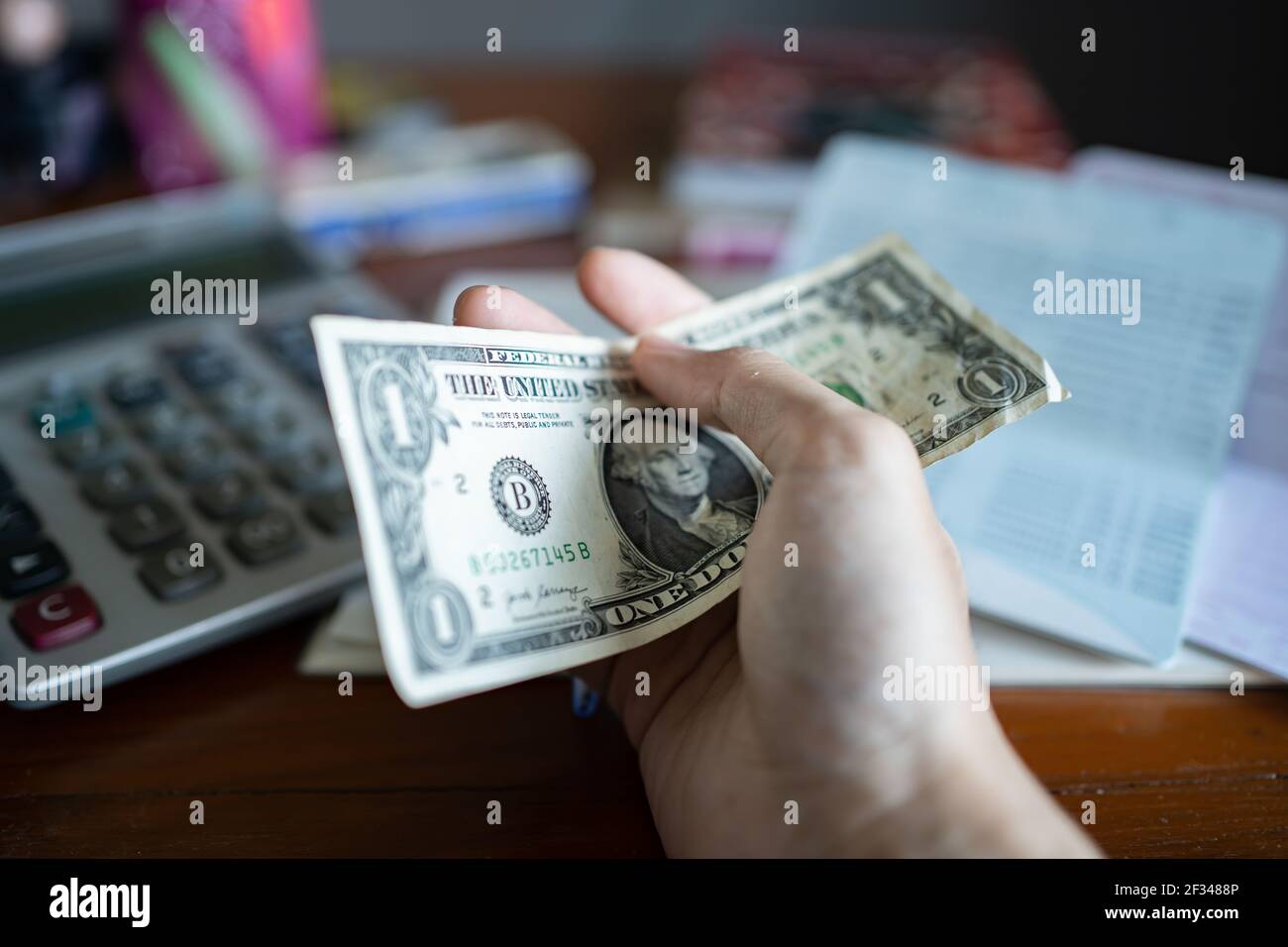 Bankruptcy concept. Only one dollar left Stock Photo - Alamy