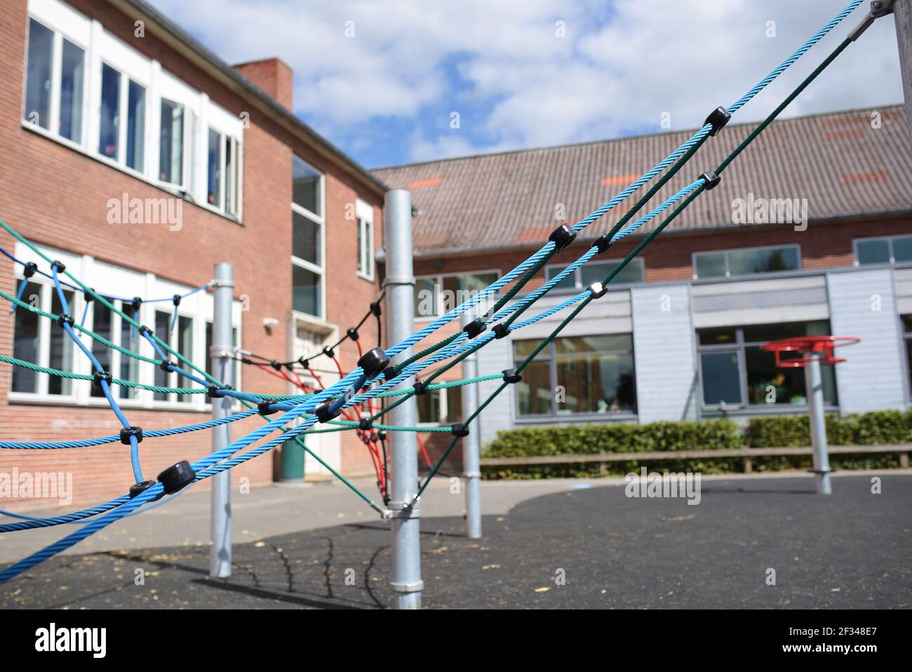 an empty playground with spider web play equipment Stock Photo - Alamy