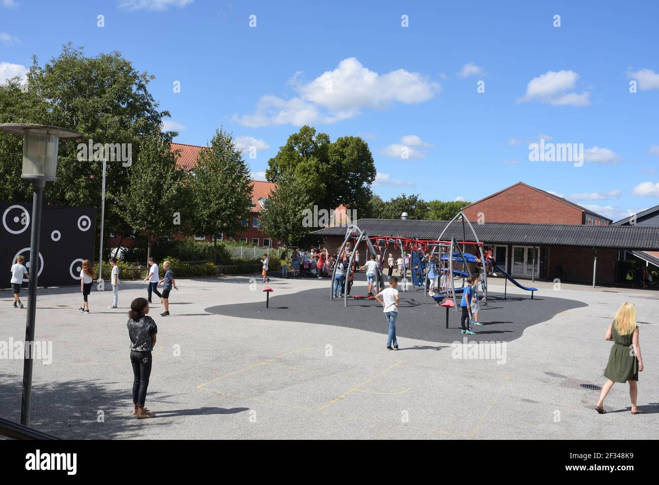 children having fun on the playground at school during recess Stock ...