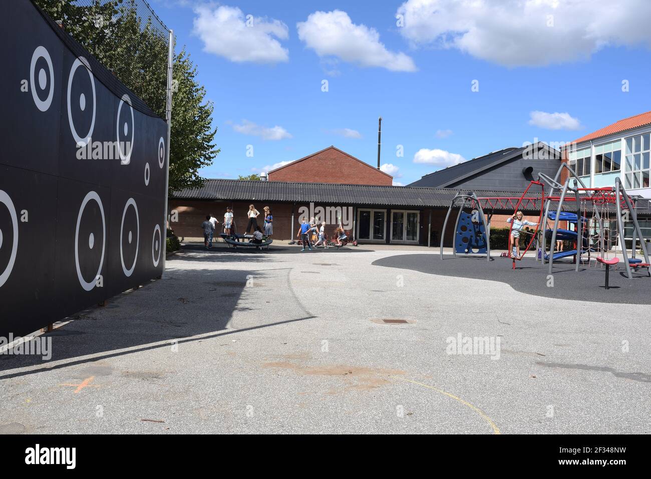 Empty schoolyard with concrete playground Stock Photo - Alamy