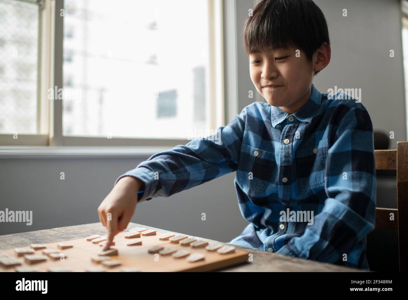 Elementary School Student as a Shogi (Japanese Chess) Player Stock ...